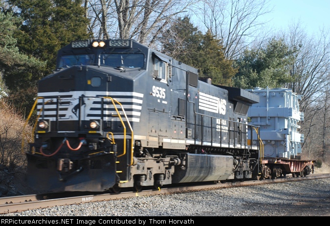 NS 053 is westbound with a high and wide load as its only load